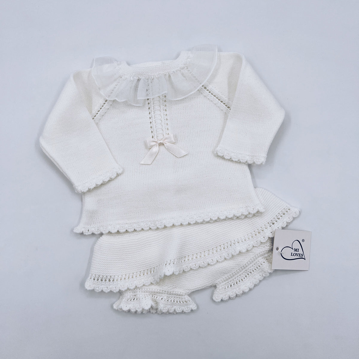 Beautiful Ivory 2 piece baby set with pretty frill details on the bloo ...